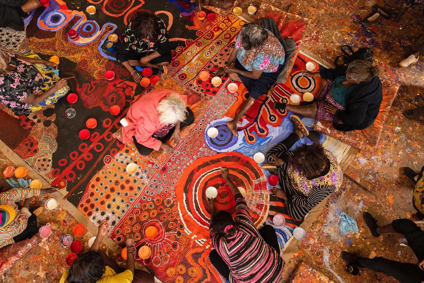 APY Art Centre Collective's Women’s collaborative painting in progress ...